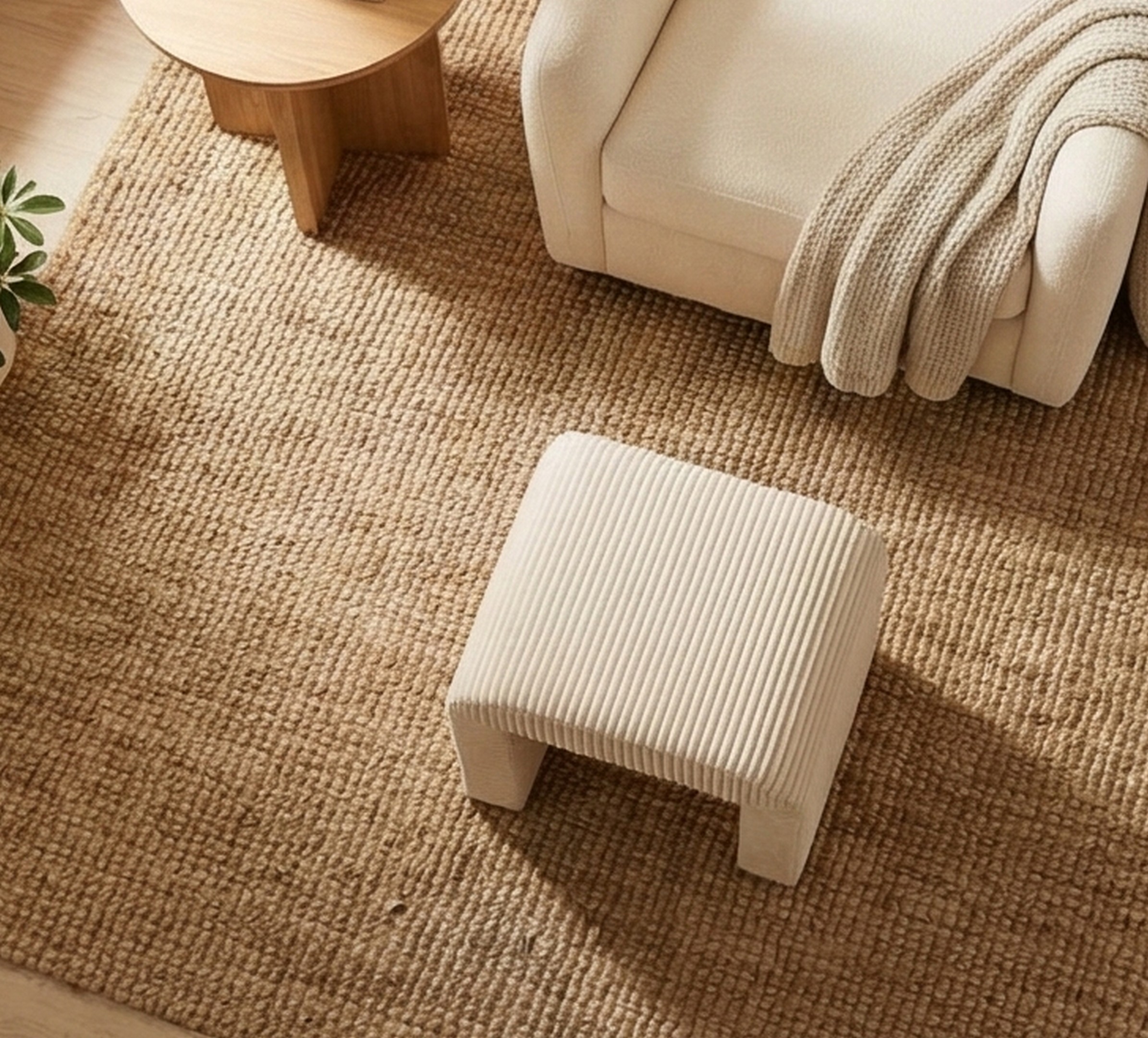 Cream-colored Delor model footstool - City Furniture